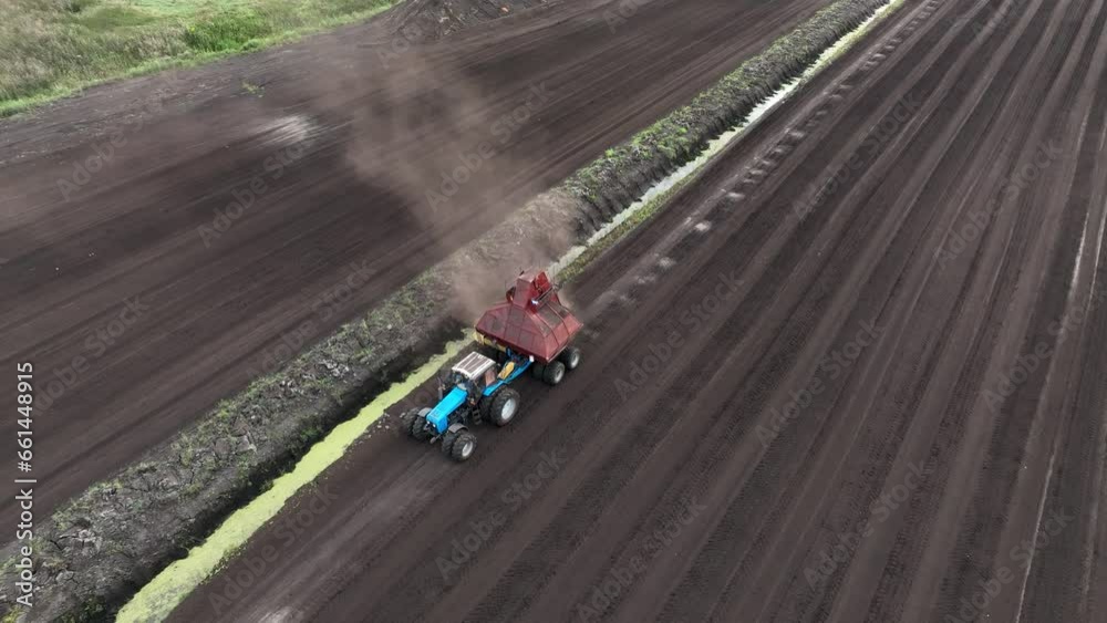 Peat Harvester Tractor on Collecting Extracting Peat. Mining and ...