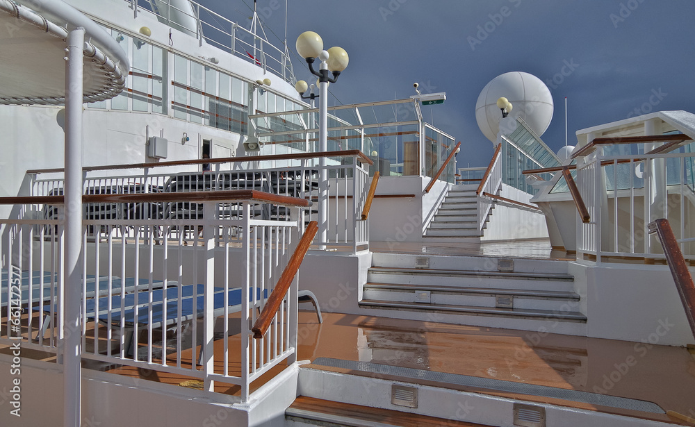 Outdoor promenade and pool decks of modern cruiseship cruise ship liner ...