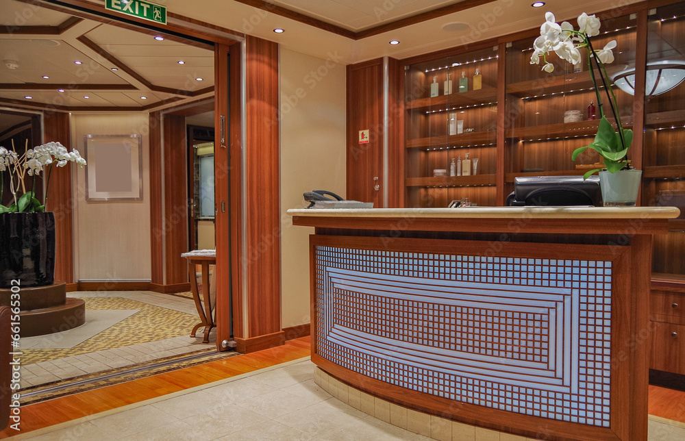 Welcome desk and relaxation massage therapy rooms inside spa thermal ...