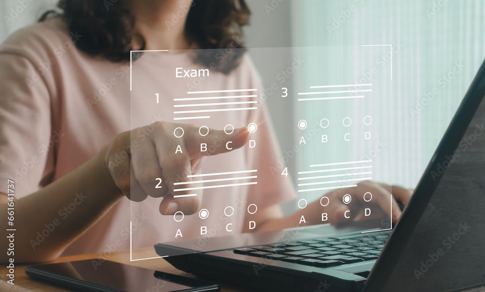 Online exam education concept. Student use computer to check correct ...