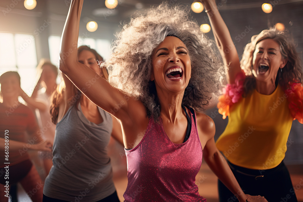 Image of a group of women over 50 years old doing a Zumba class at a ...