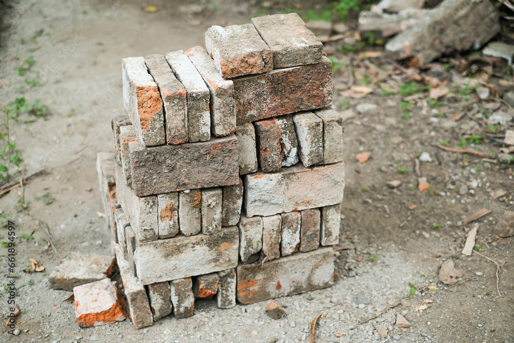 Solid clay brick used for construction, dark red brick. pile of bricks ...