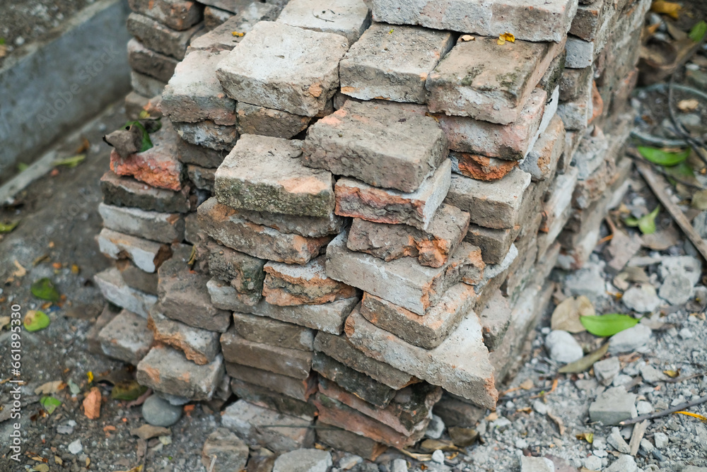Solid clay brick used for construction, dark red brick. pile of bricks ...