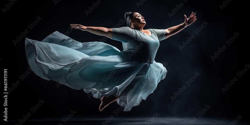 Plus-sized dancer performing in a contemporary ballet production ...