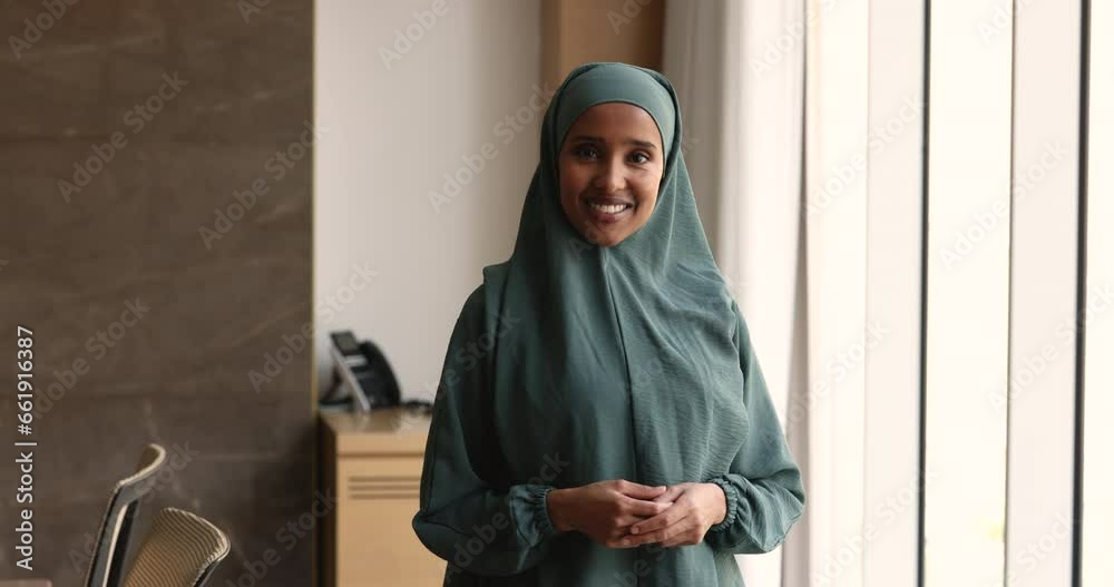 Beautiful young Somalian businesswoman wear hijab posing in modern ...