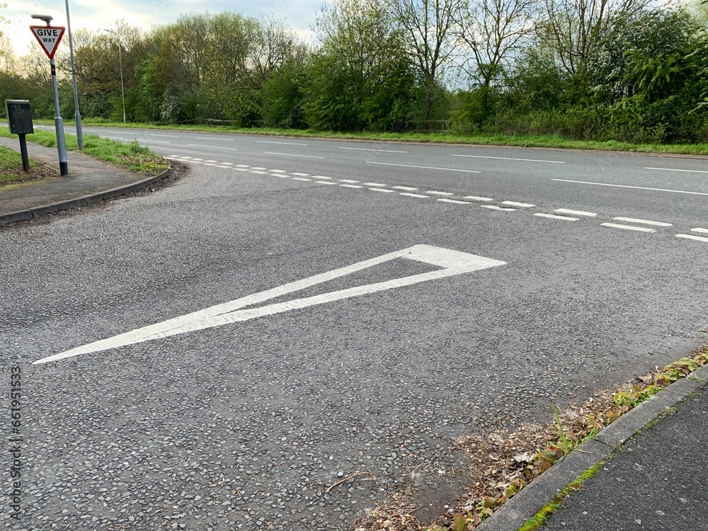 Picture of a UK road junction give way signs and markings Stock Photo ...