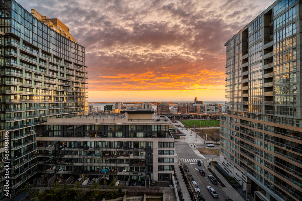 Behold the mesmerizing beauty of a Toronto sunset. Condos silhouette ...