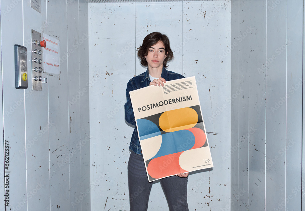 Mockup of woman holding customizable A2 vertical poster in elevator ...
