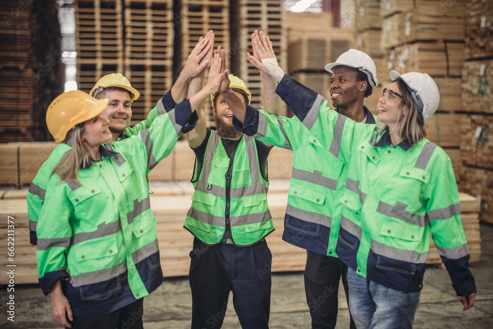 Wood Turners team building to shapes, balances wood with hand and power ...