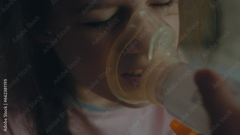 Little girl having respiratory difficulty. Mom taking care of child ...