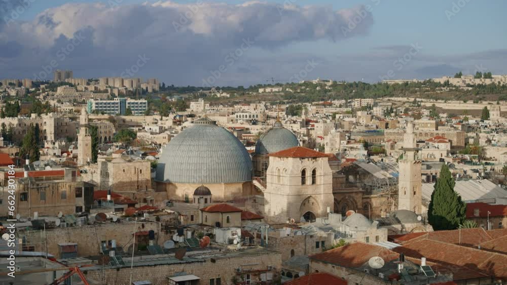 Church of the holy Sepulchre seen between buildings in the old city of ...