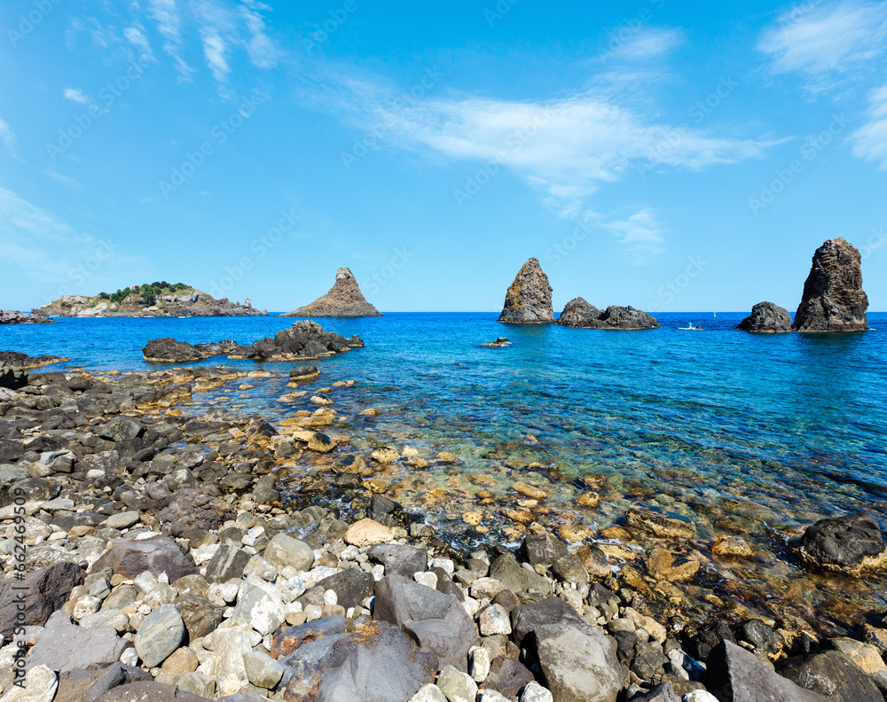 Cyclopean Coast and the Islands of the Cyclops on Aci Trezza town ...