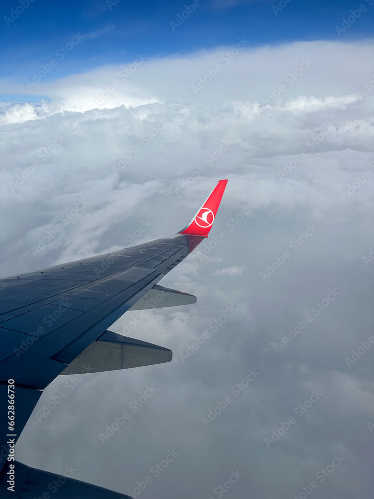 Istanbul, Turkey - 27.08.2023. THY, Turkish Airlines airplane wing over ...