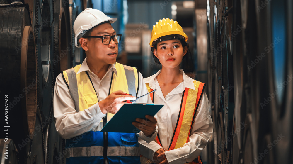 Warehouse inventory management in metalwork factory with engineer or ...