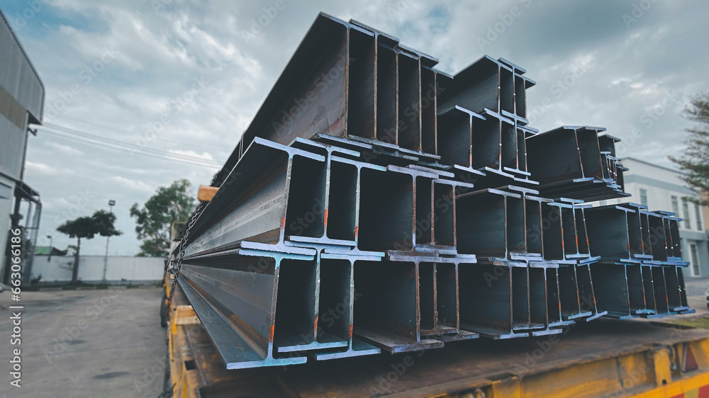 Steel beams production. Metal girders stack on project construction ...