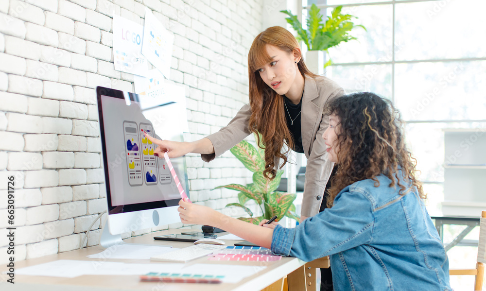 Asian professional successful young female creative graphic designer ...