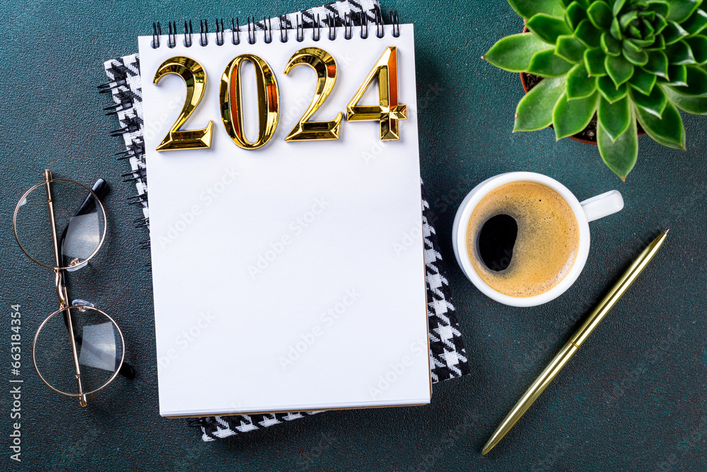 New year resolutions 2024 on desk. 2024 resolutions list with notebook ...