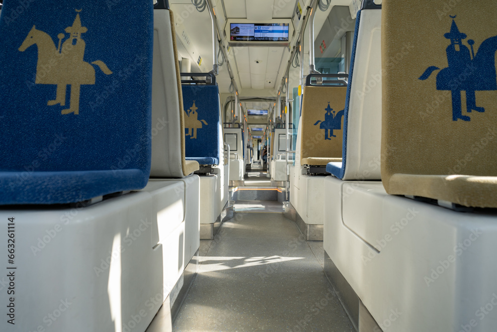 Inside view of passenger tram in Cracow. Empty cabin interior with ...