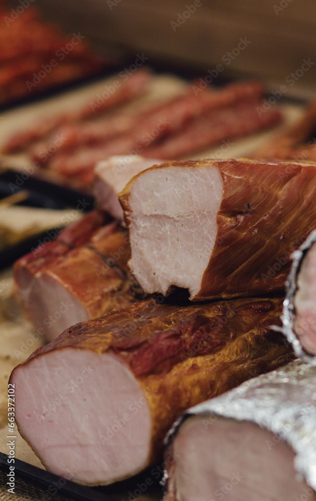 Hand made smoked meat products. Display meats, cold cuts and sausages ...