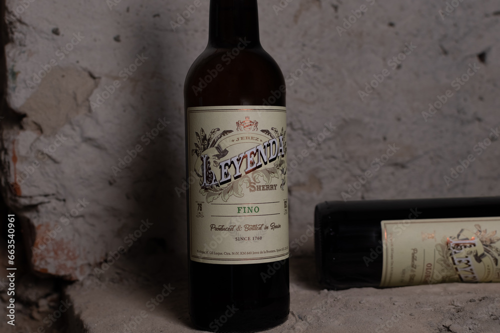Bottles of spanish sherry Leyenda on brick wall background. Ukraine ...