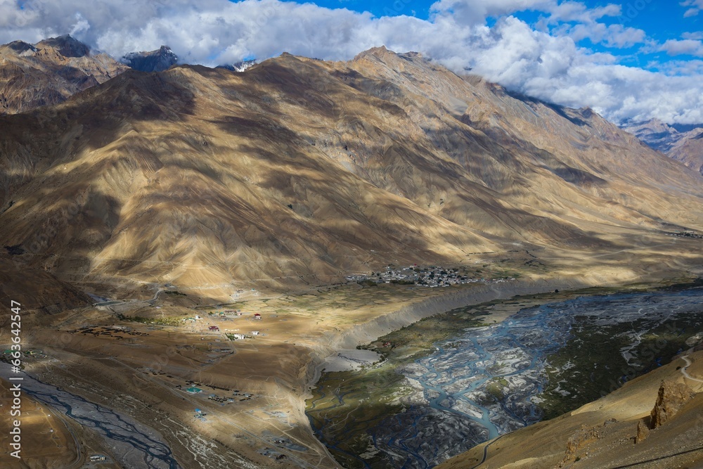 Scenic shot near Kaza, Spiti Valley, India: Brown soils, cloudy shadows ...