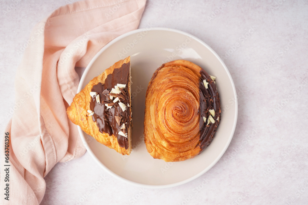 Plate of sweet croissant with chocolate on white background Stock Photo ...