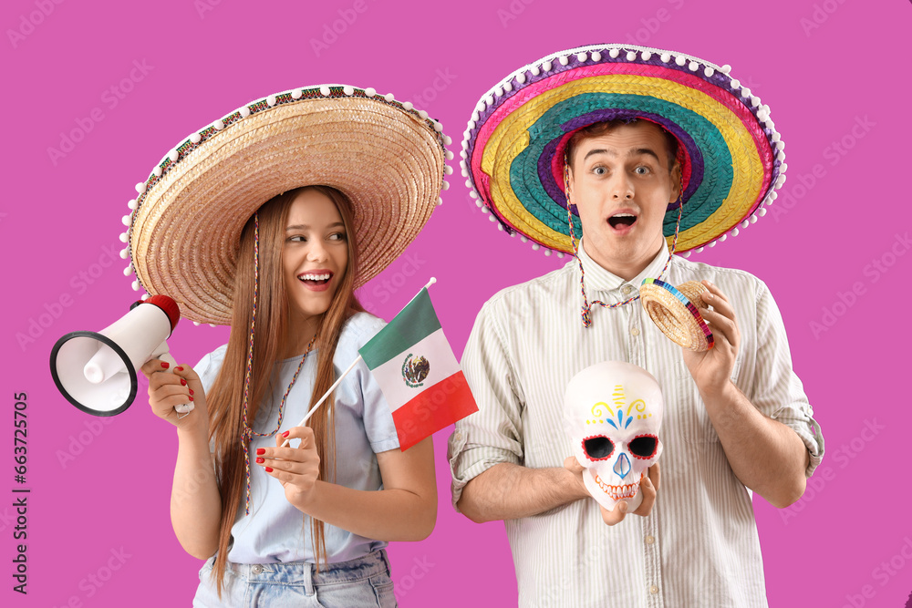 Young couple with Mexican symbols and megaphone on purple background ...