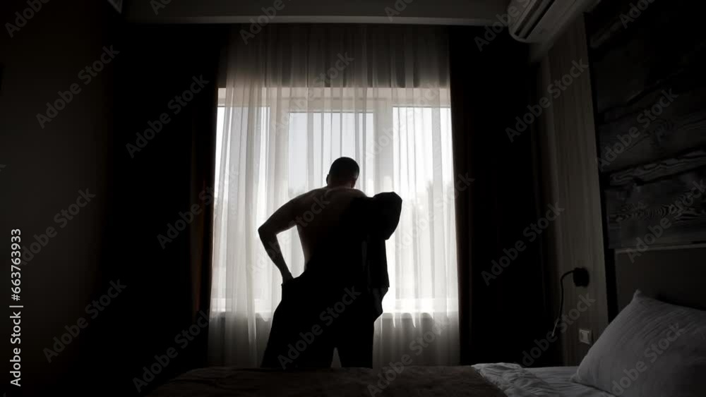 Morning of a business man. A business man gets ready for work in the ...