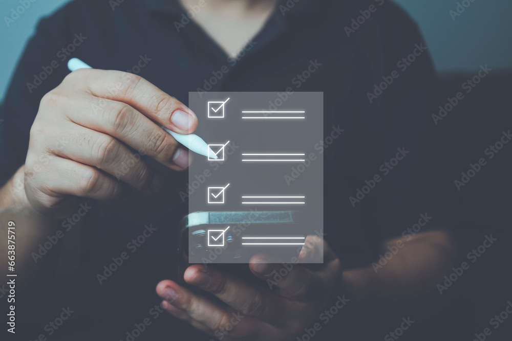 Checklist,Business performance checklist,businessman using laptop doing ...