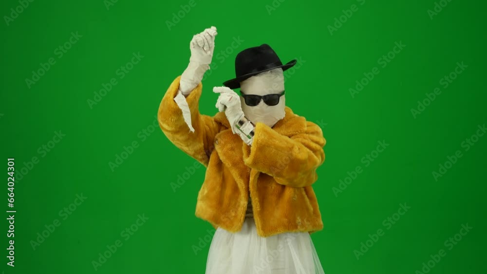 Green screen isolated chroma key video capturing a glamorous mummy ...