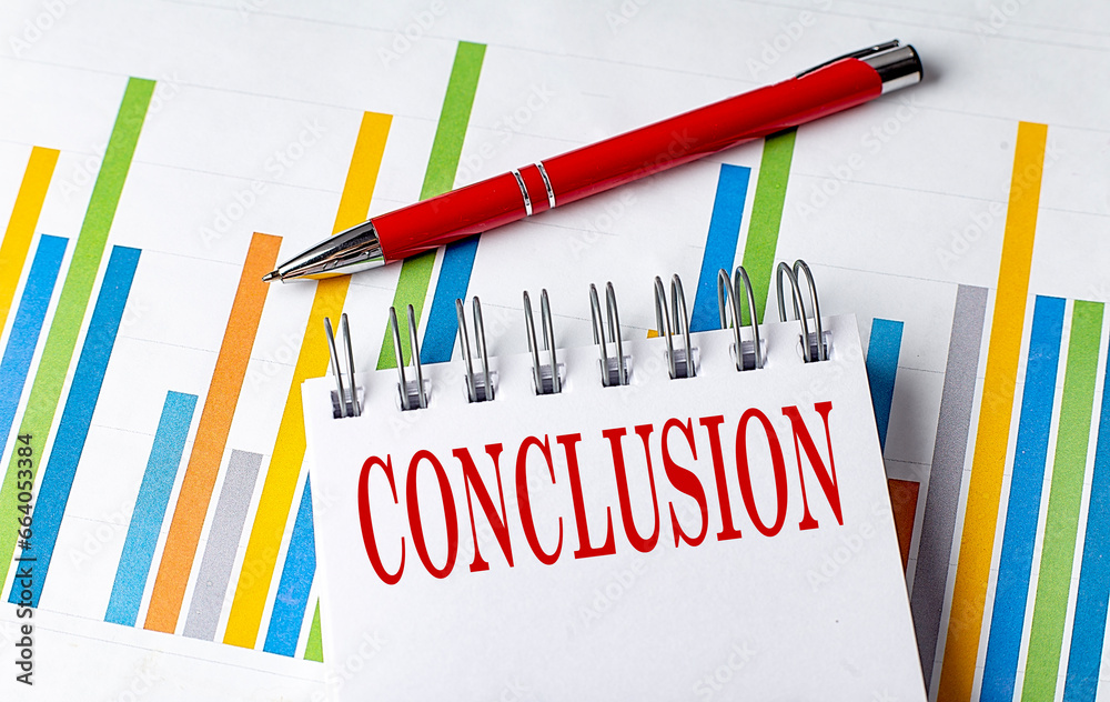 CONCLUSION text on a notebook with chart and pen business concept Stock ...