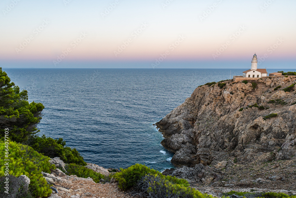 Capdepera Lighthouse at the beautiful coast with the Mediterranean Sea ...