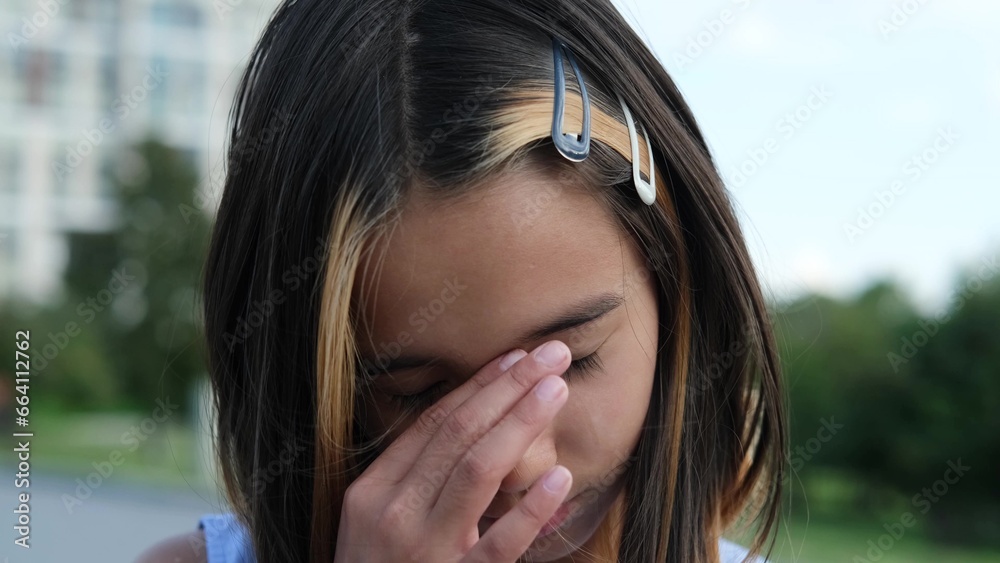 Portrait of a pensive sad little girl, front view, sad child on the ...