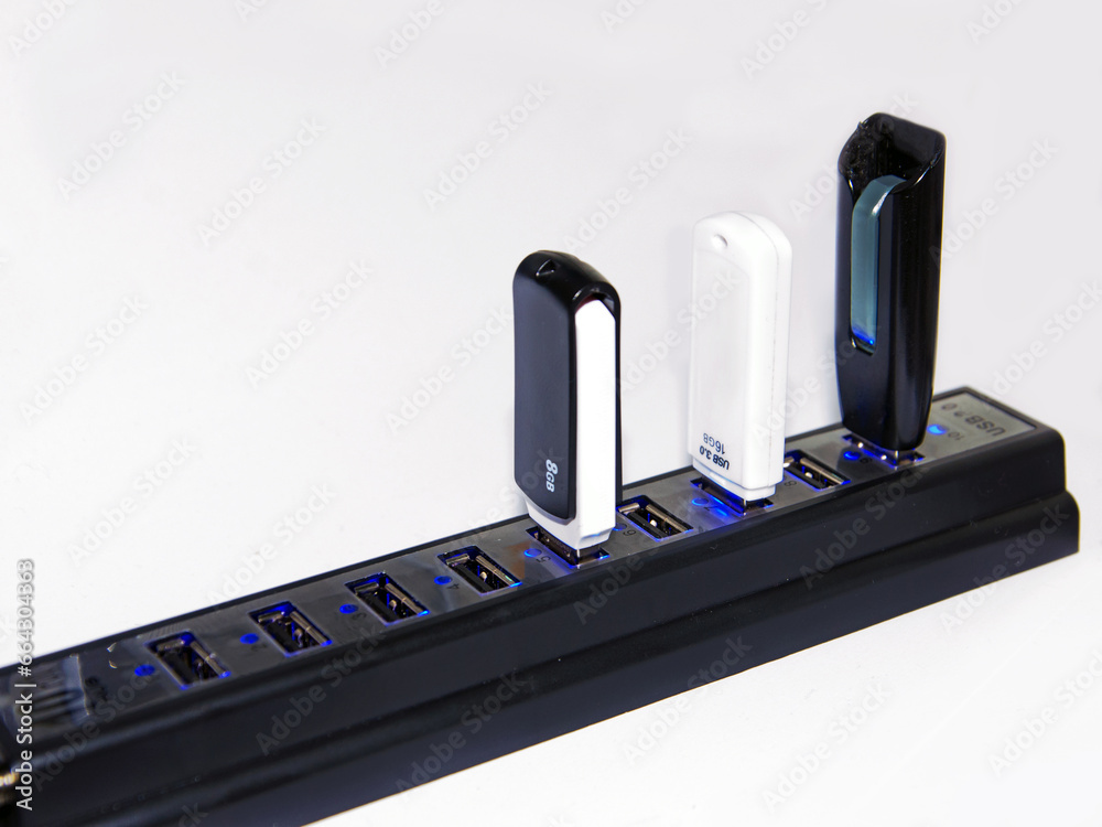 USB hub with connected flash drives. flash drives are connected to a ...