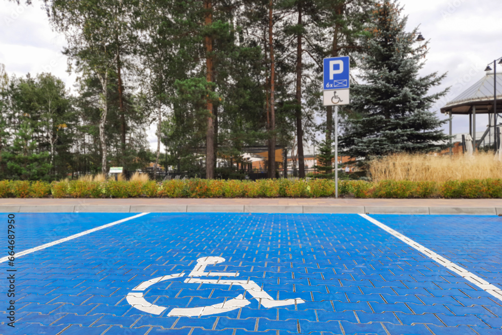 Disabled Parking Road markings and sign. Vacant parking spot near ...