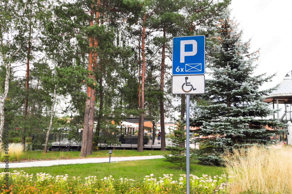 Road sign Disabled Parking in park near shopping mall. Concept of ...