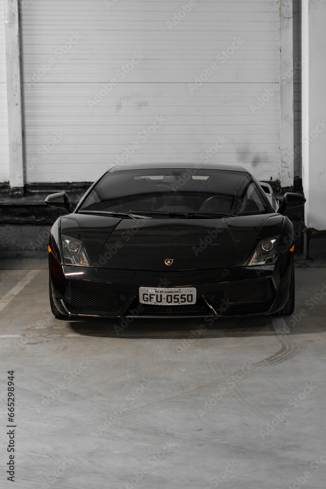 Black Lamborghini Gallardo front view in a parking lot Stock Photo ...