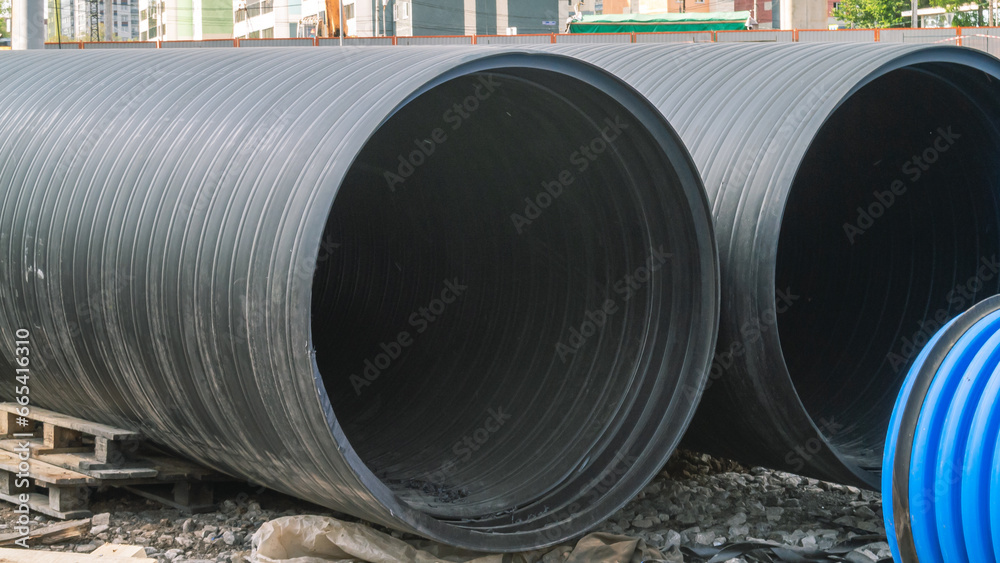Black plastic pipes of large diameter for repair of communications ...