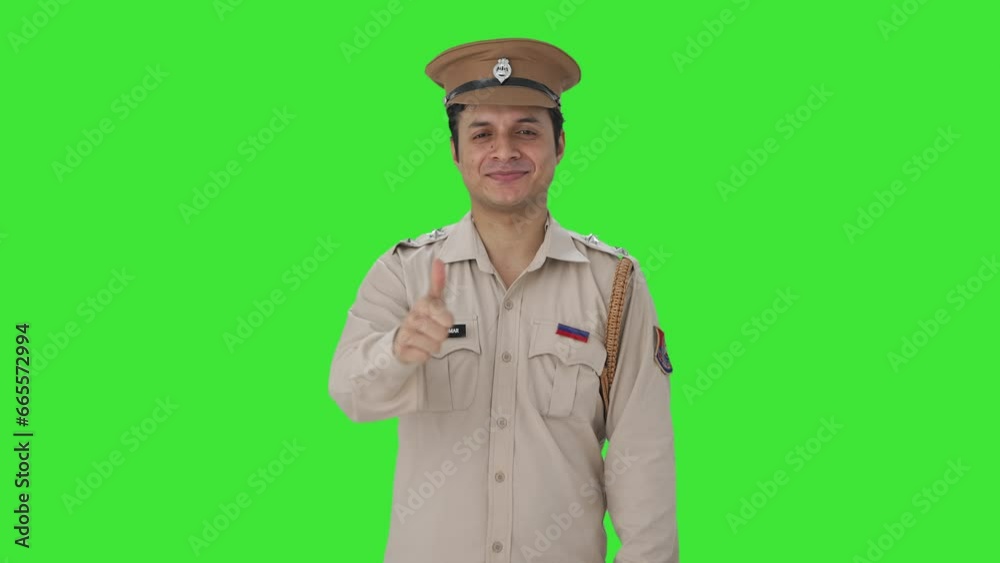 Happy Indian police officer showing thumbs up Green screen Stock Video ...