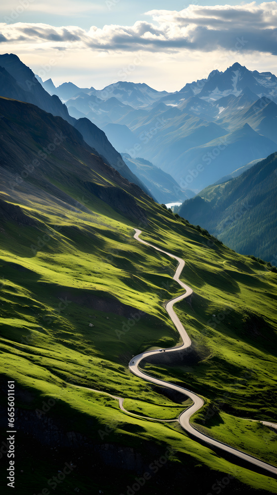 Mountain range with a winding road through the pass, mobile background ...