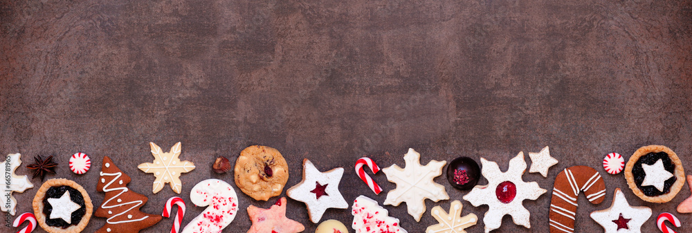 Christmas baking bottom border with an assortment of cookies and sweet ...