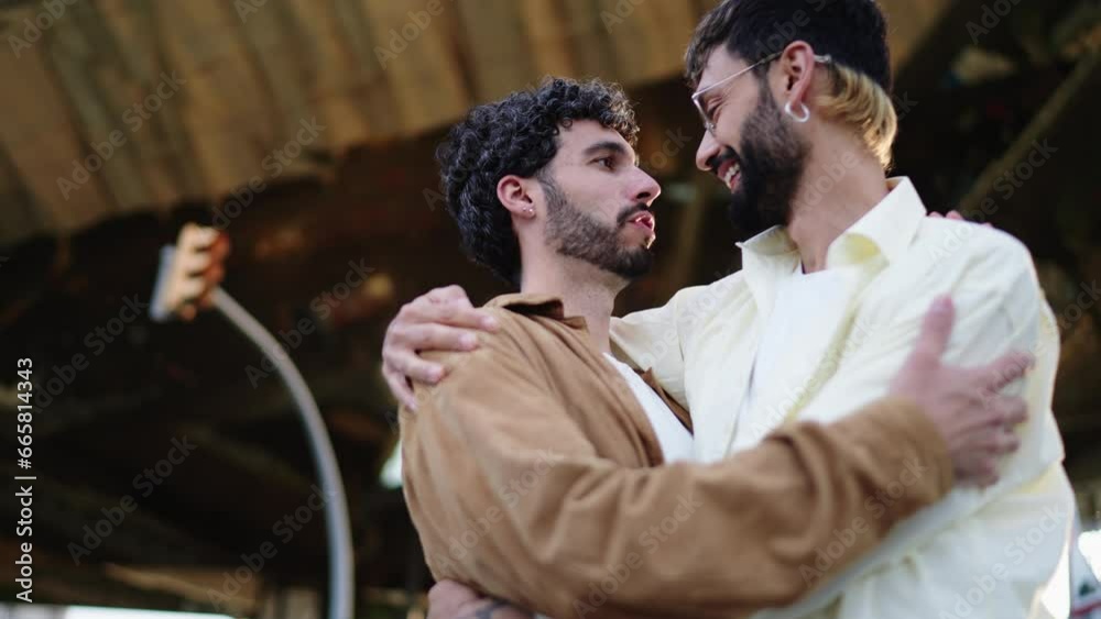 Tender moment between two gay men as they share kiss, LGBTQ couple joy ...