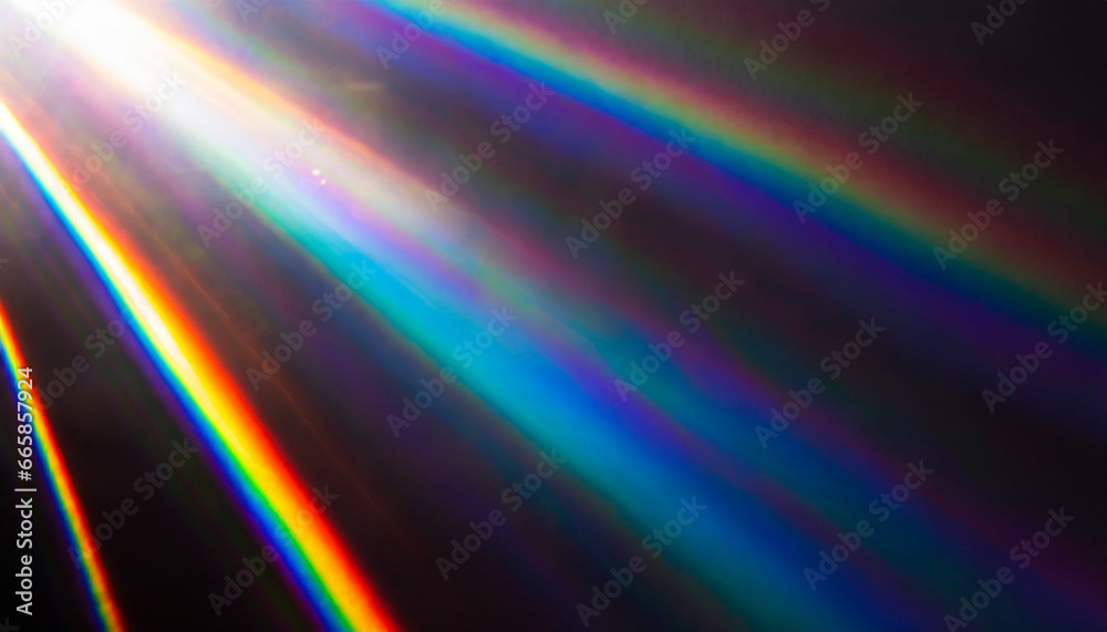 rainbow light effect from sun flares on black background colorful glare ...