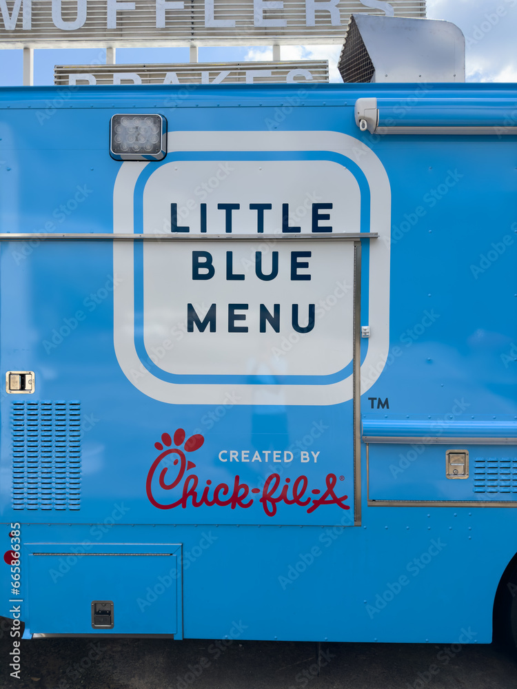 Side Of Chick-Fil-A's LIttle Blue Menu Food Truck On Opening Day In ...