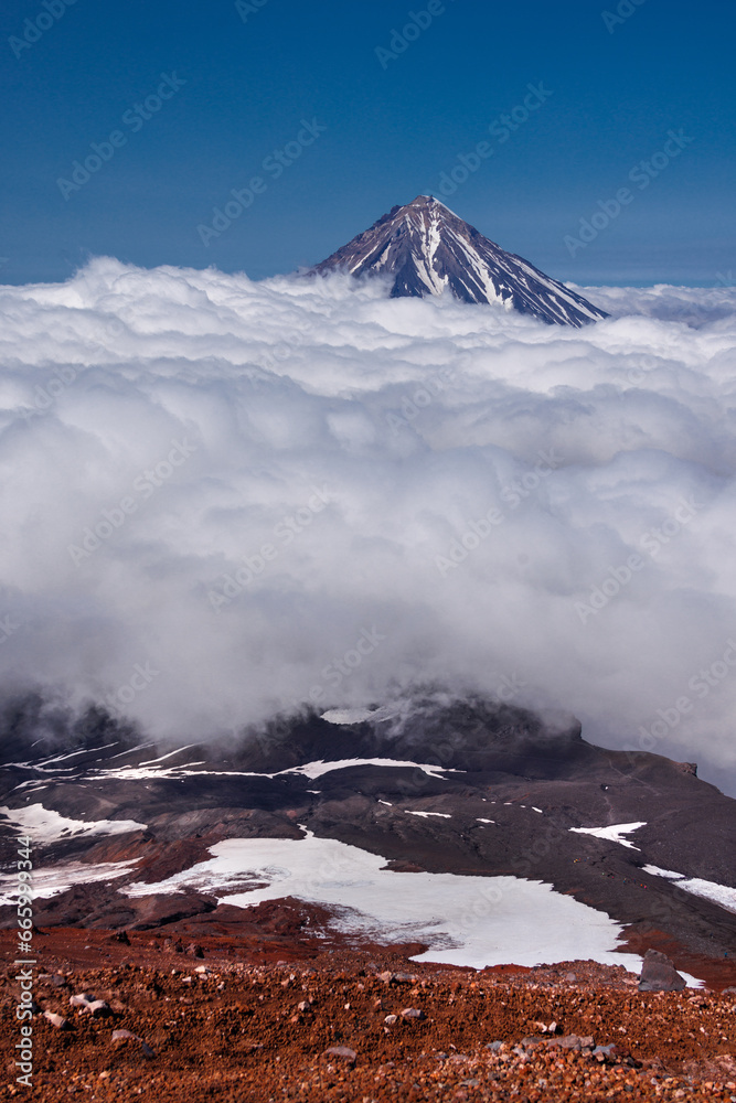 Kamchatka volcanic landscape: view to top of cone of Koryaksky Volcano ...