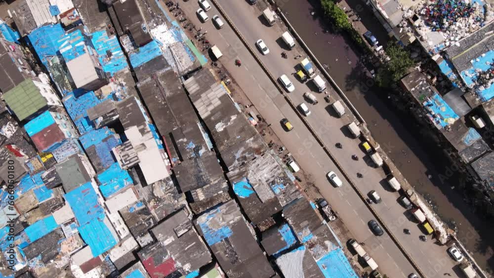 Aerial rooftop view of shanty slums in Dharavi, Mumbai India revealing ...