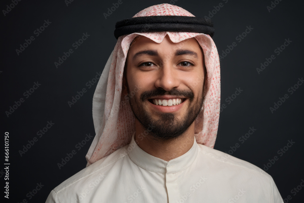 Everyday people. A middle eastern man with a beard. A smiling man ...
