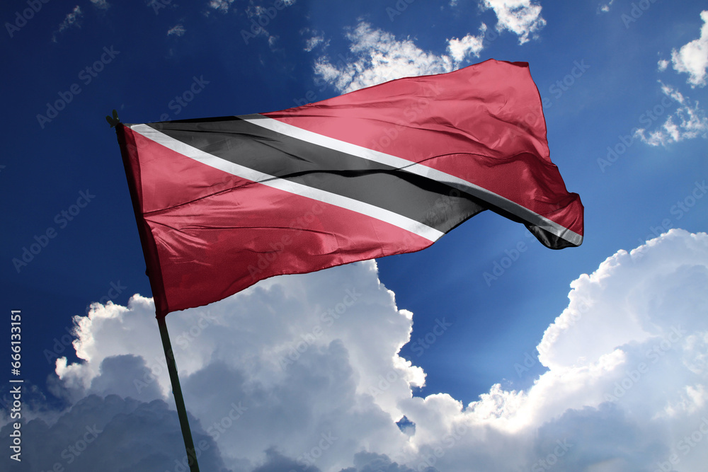 national flag of Trinidad and Tobago waving in the wind on a clear day ...