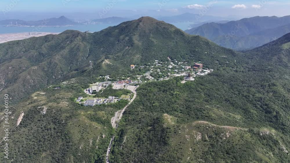 Aerial drone skyview of Po Lin Monastery Tian Tan Buddha and Ngong Ping ...