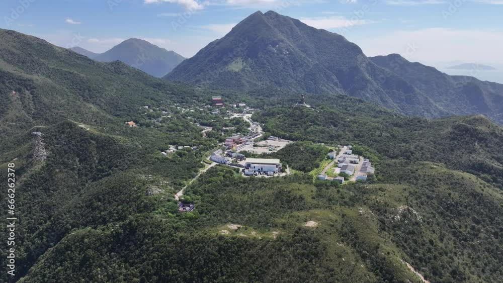 Aerial drone skyview of Po Lin Monastery Tian Tan Buddha and Ngong Ping ...
